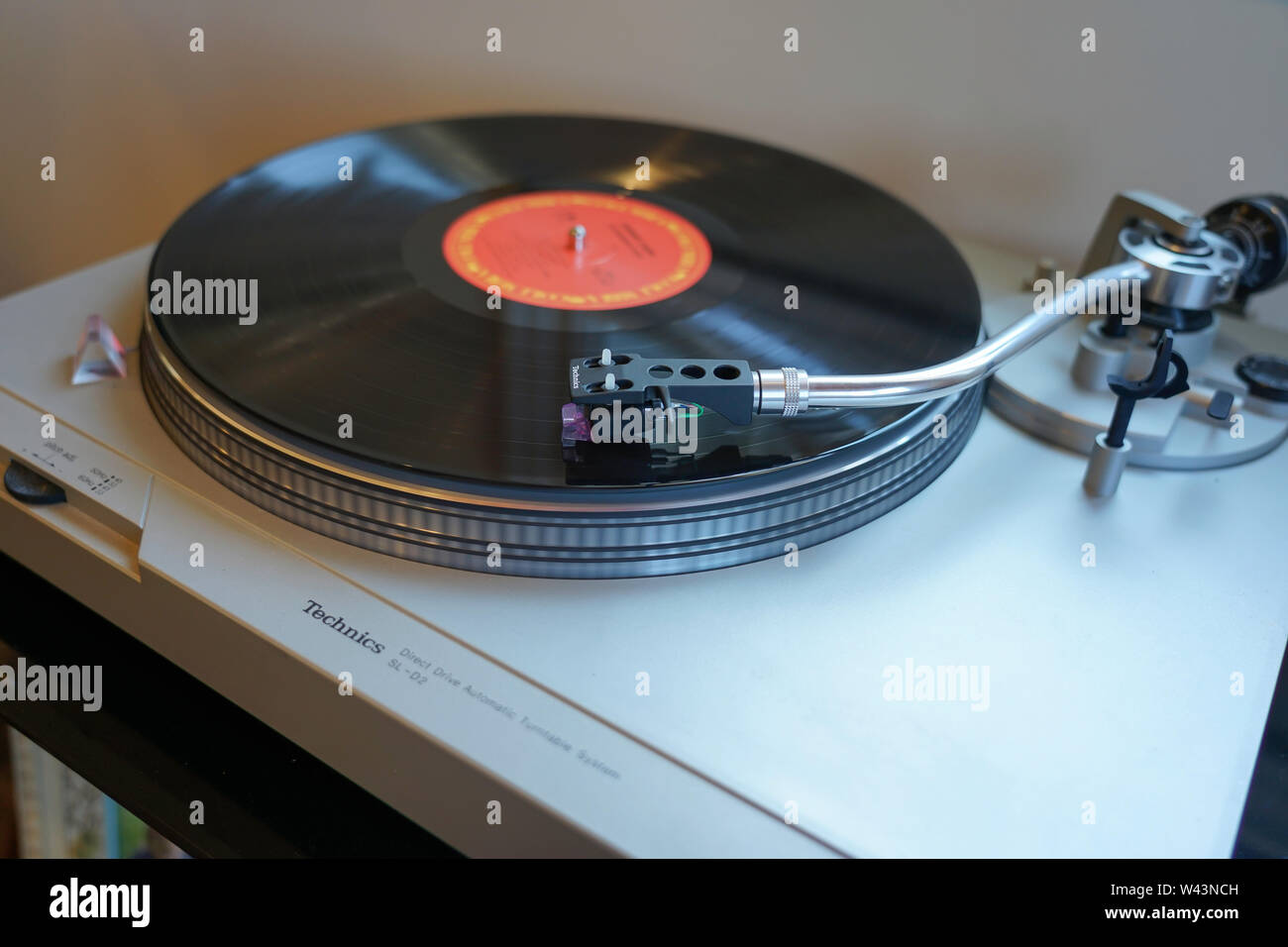 Vinyl Record Player showing the stylist or needle and vinyl red on ...