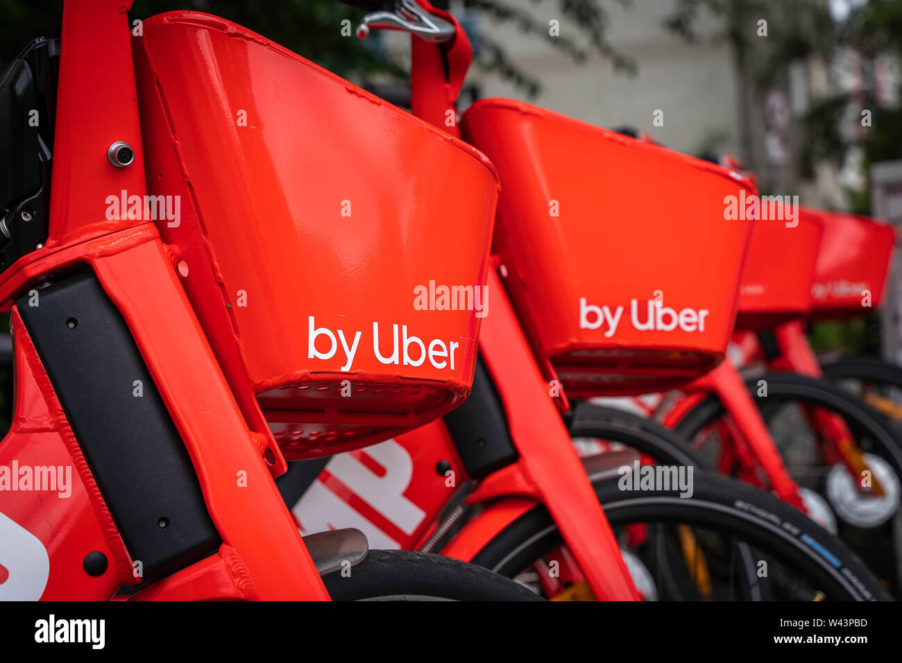 BERLIN, GERMANY - JULY 16 2019: Uber joins the dockless fleet with Jump ...