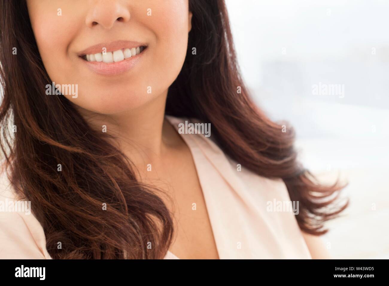 Female long hair smiling hi-res stock photography and images - Alamy