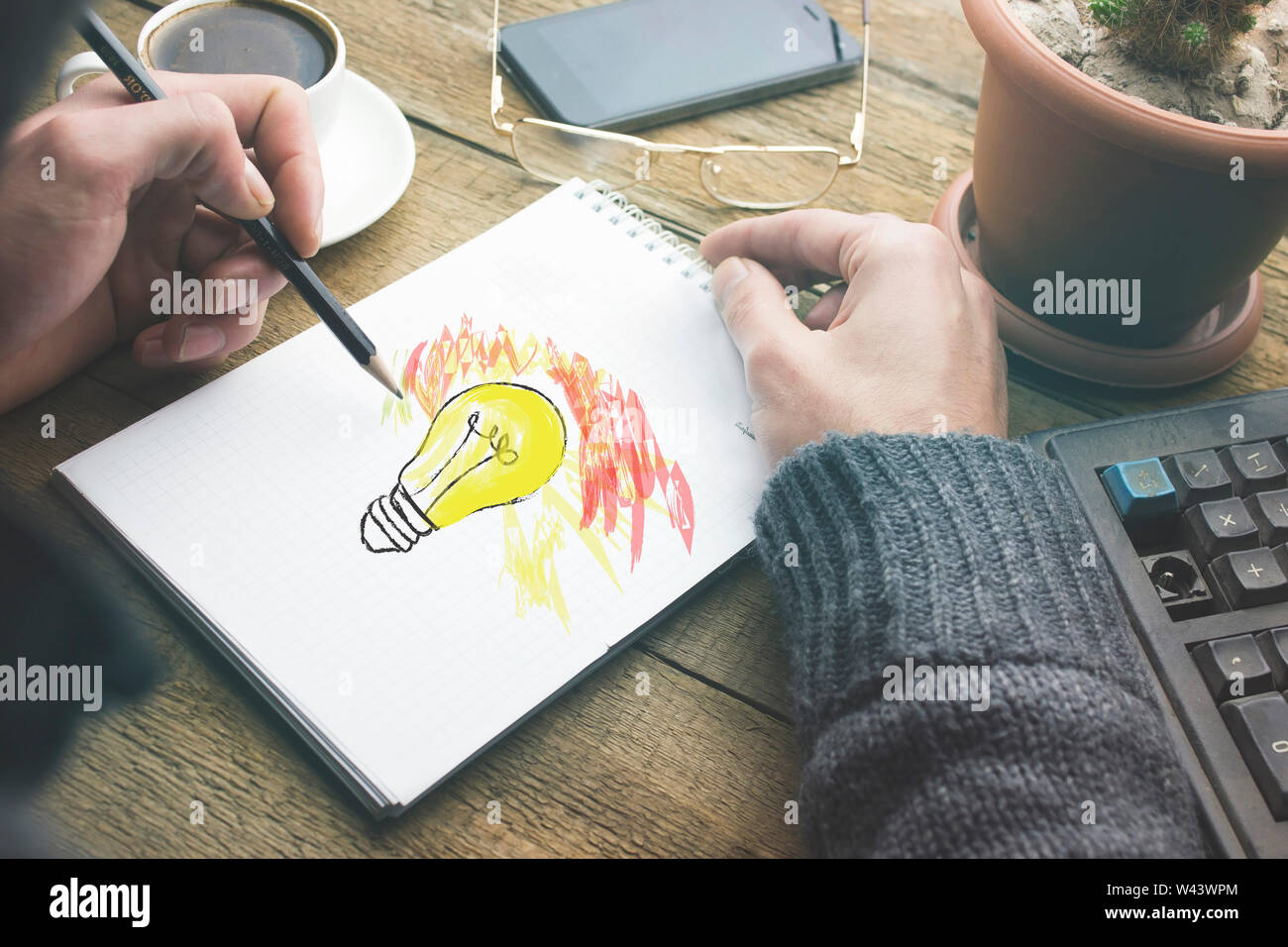 Business man writing ideas on paper Stock Photo - Alamy