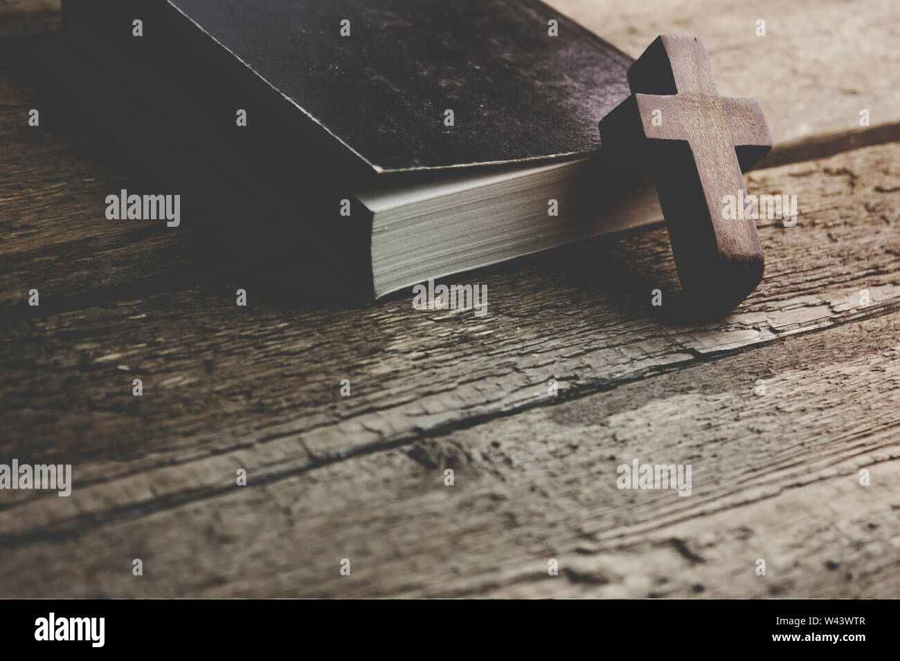 cross on the book background Stock Photo - Alamy