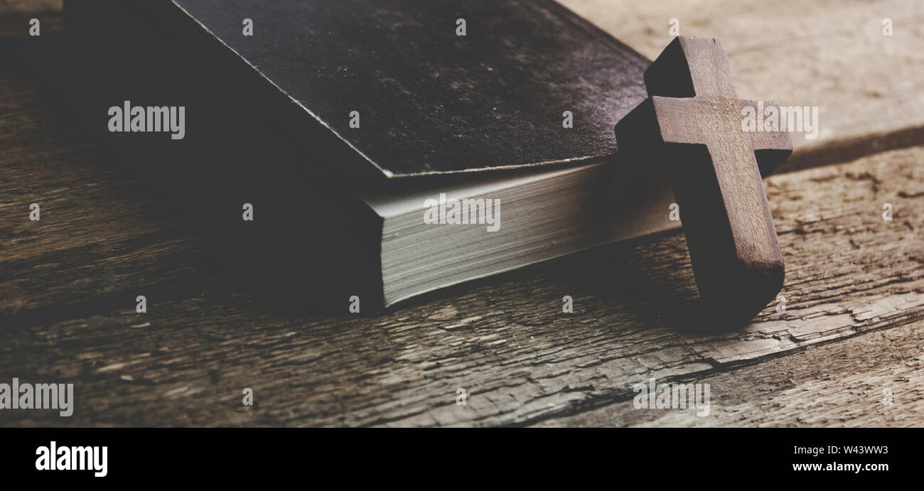 cross on the book background Stock Photo - Alamy