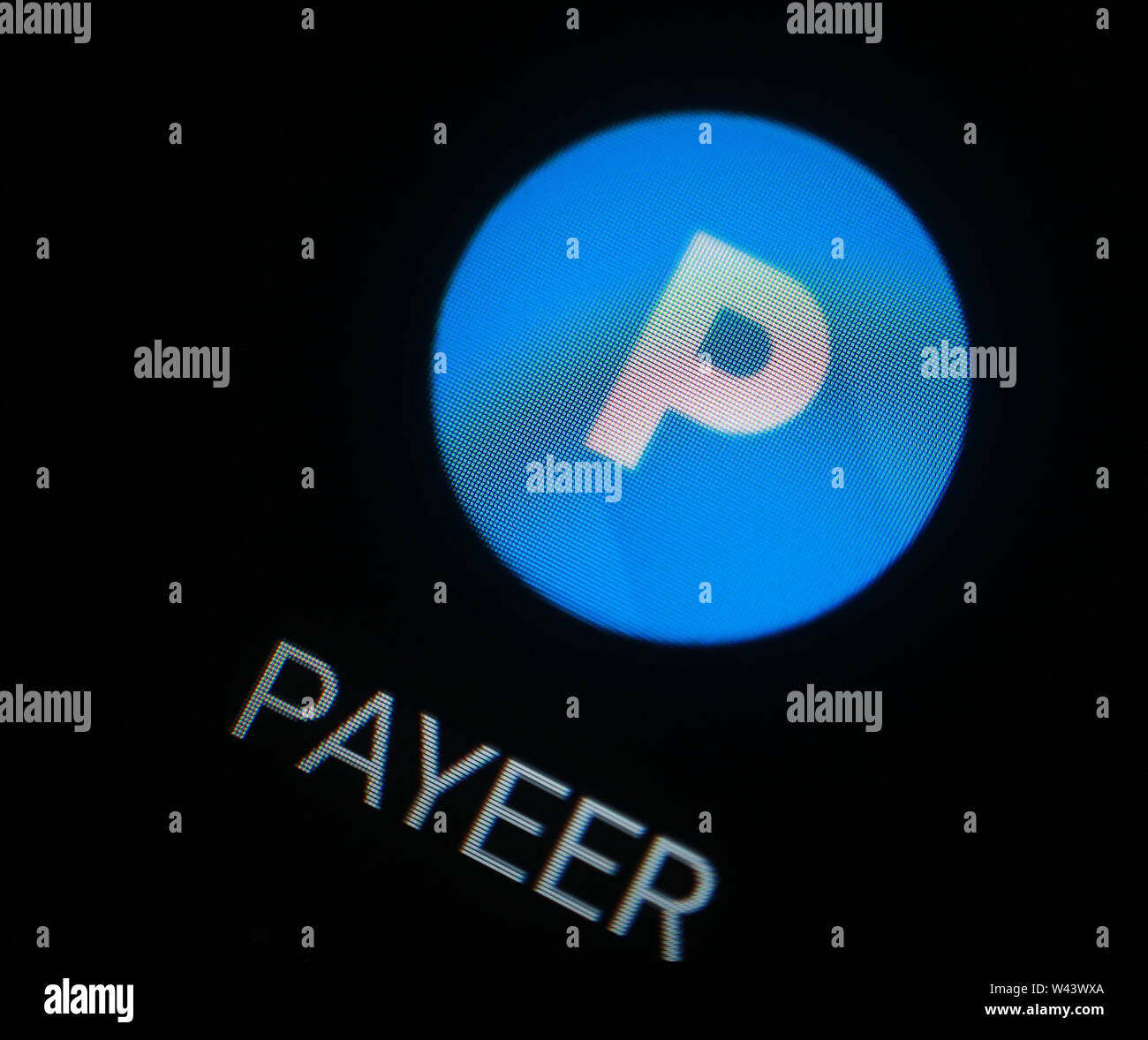 Payeer application icon on stock exchange Stock Photo - Alamy
