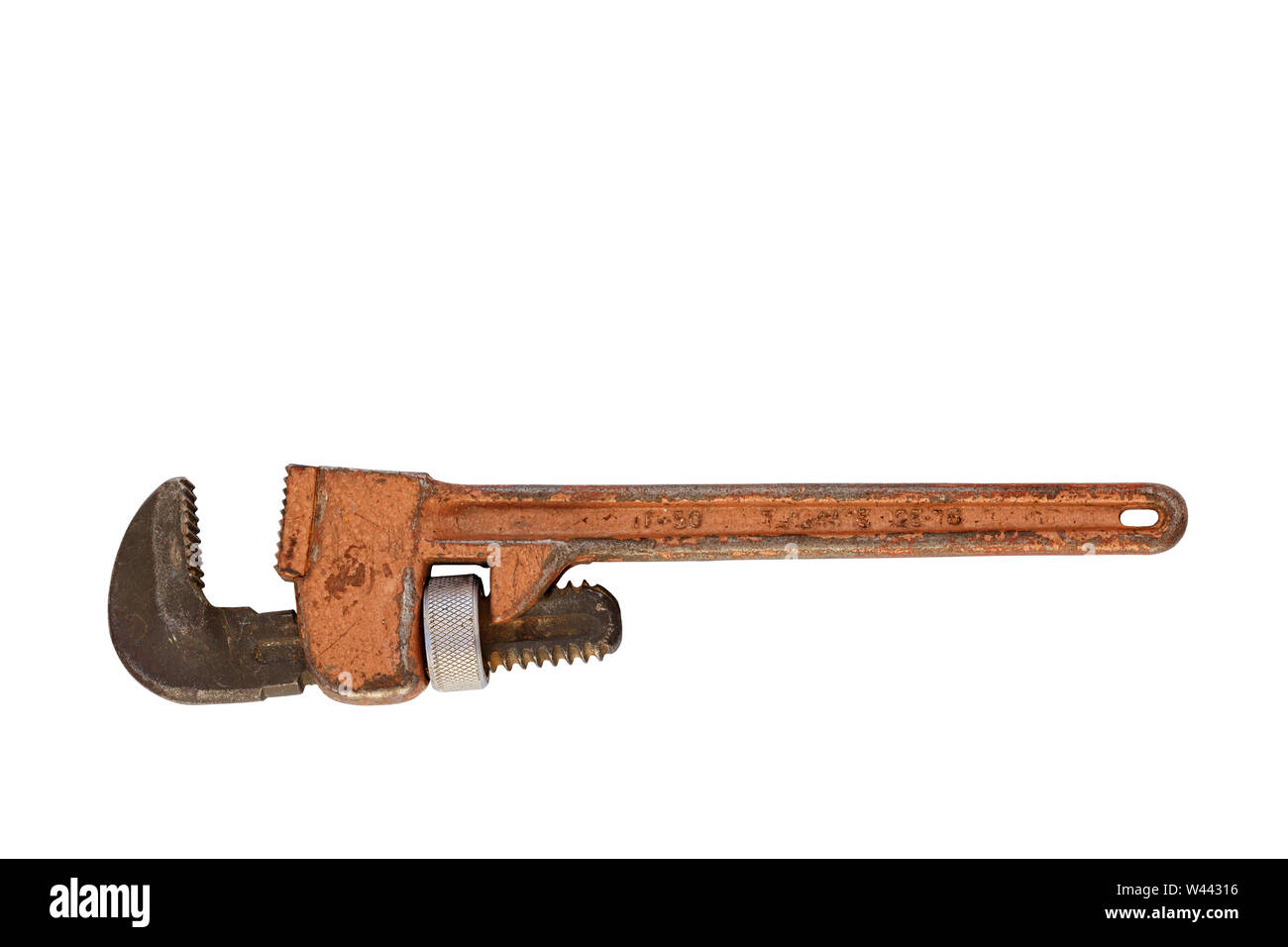 Old metal adjustable pipe wrench horizontal and isolated on white ...