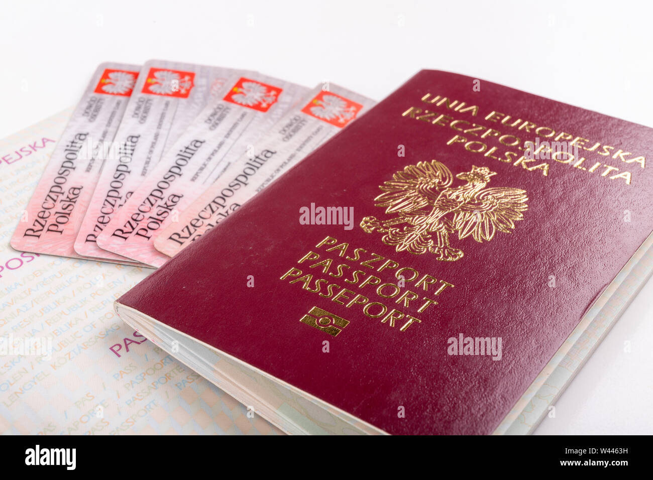 Polish passport and ID card on a white table. Personal documents from a ...
