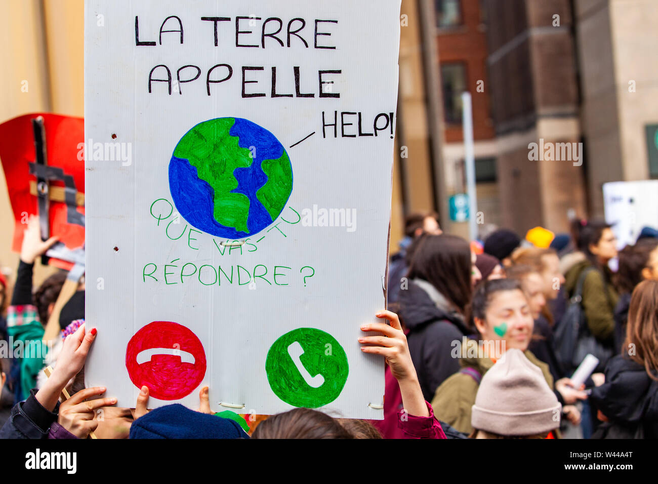 A conceptual sign depicting planet earth calling for help is viewed ...