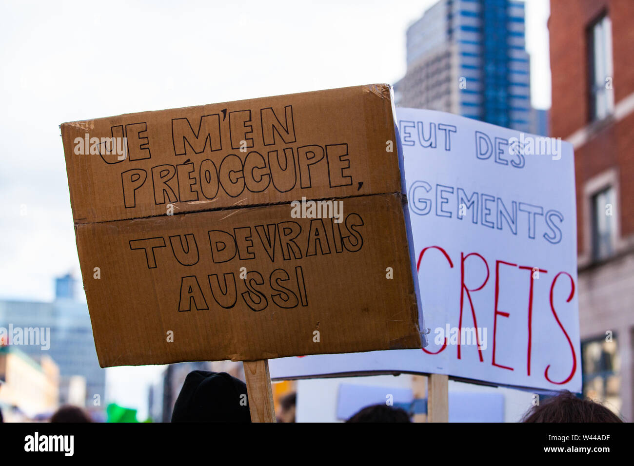 A French Sign Reads I Do Care You Should Too As Environmentalists March Against Climate Change a-french-sign-reads-i-do-care-you-should-too-as-environmentalists-march-against-climate-change