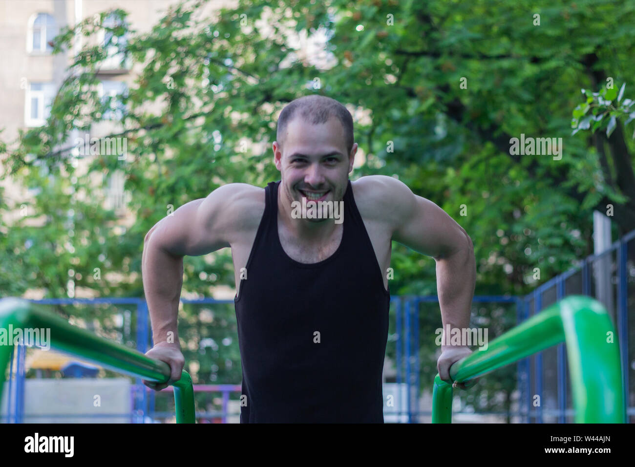 happy athlete doing exercise workout fitness young gym training Stock ...