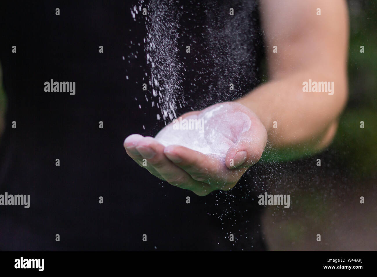 sport hands talc powder muscular talcum gym Stock Photo - Alamy