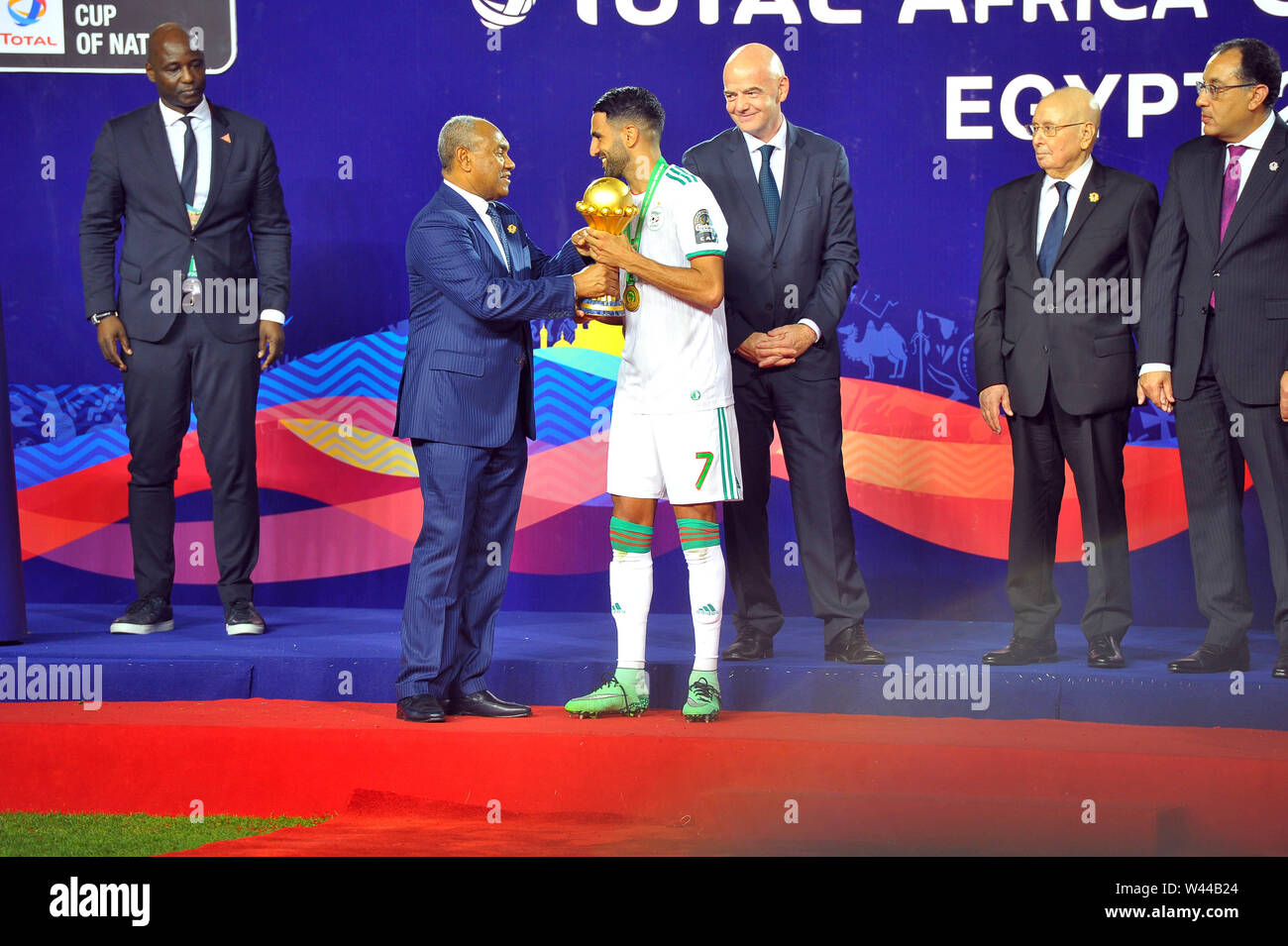 Cairo, Egypt. 19th July, 2019. CAF President Ahmad Ahmad awards trophy ...