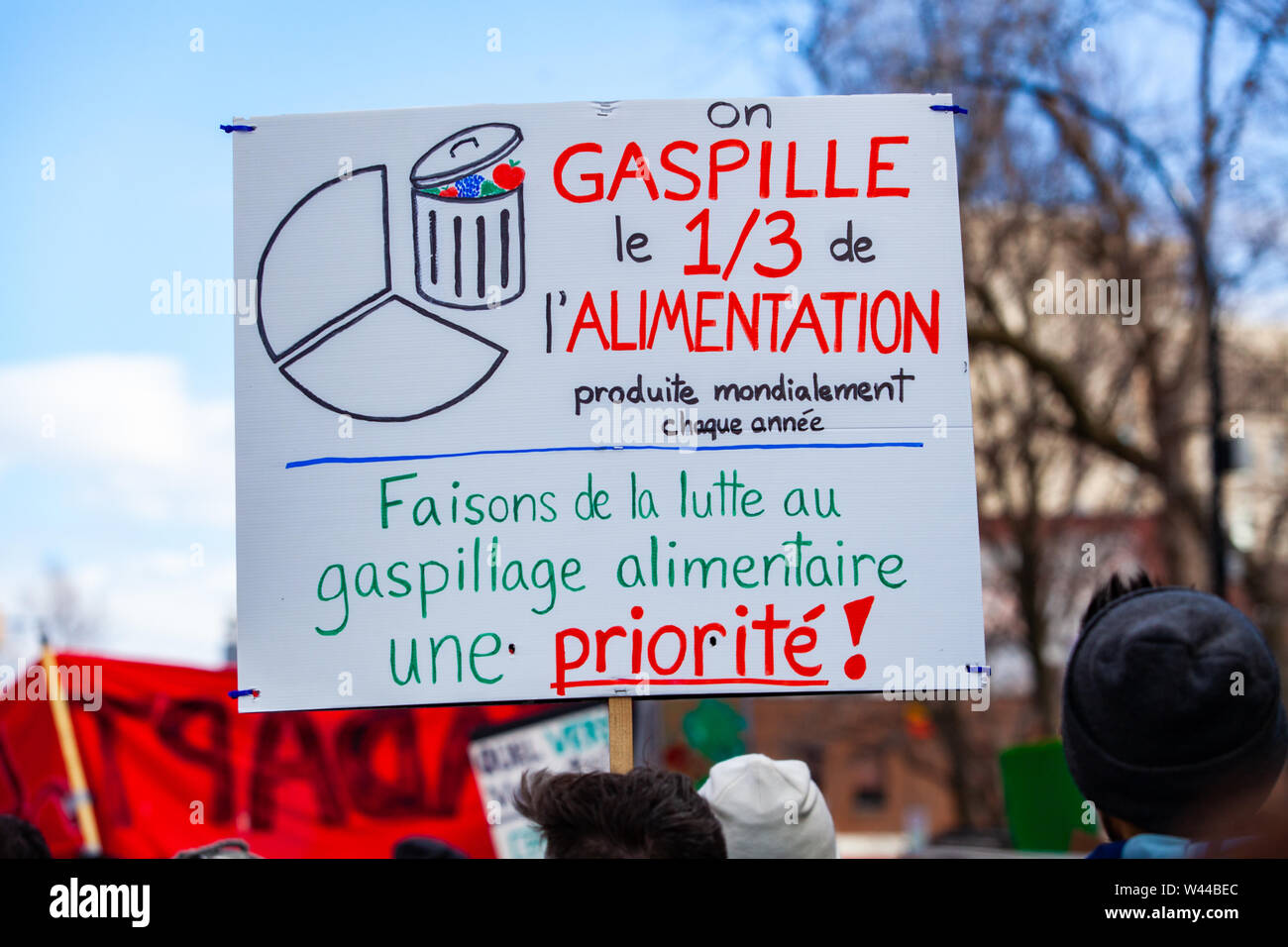 A French poster depicts the amount of household waste and says we must ...