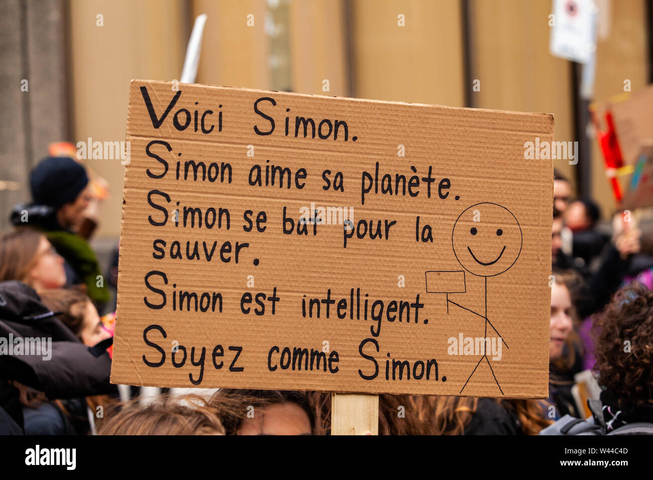 A French cardboard sign depicts the this is Simon, be like Simon meme ...