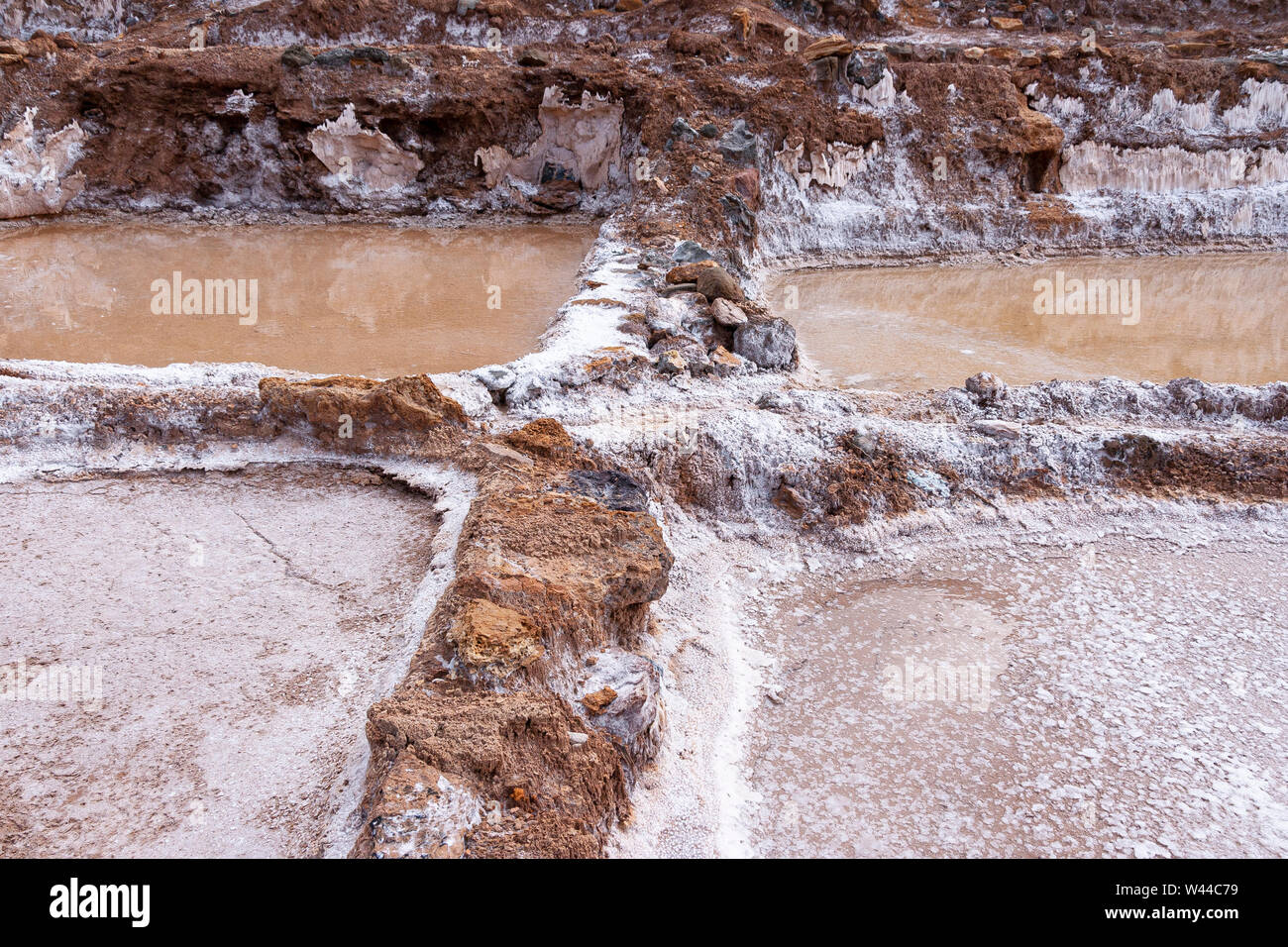 Salt mine terraces in Peru Stock Photo - Alamy