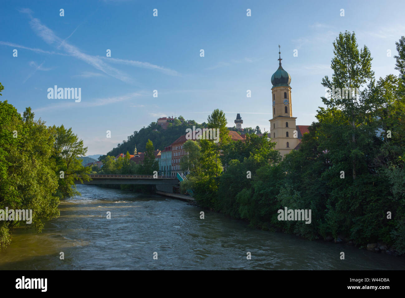 Mur river, the Franciscan Church tower and the famous clock tower ...
