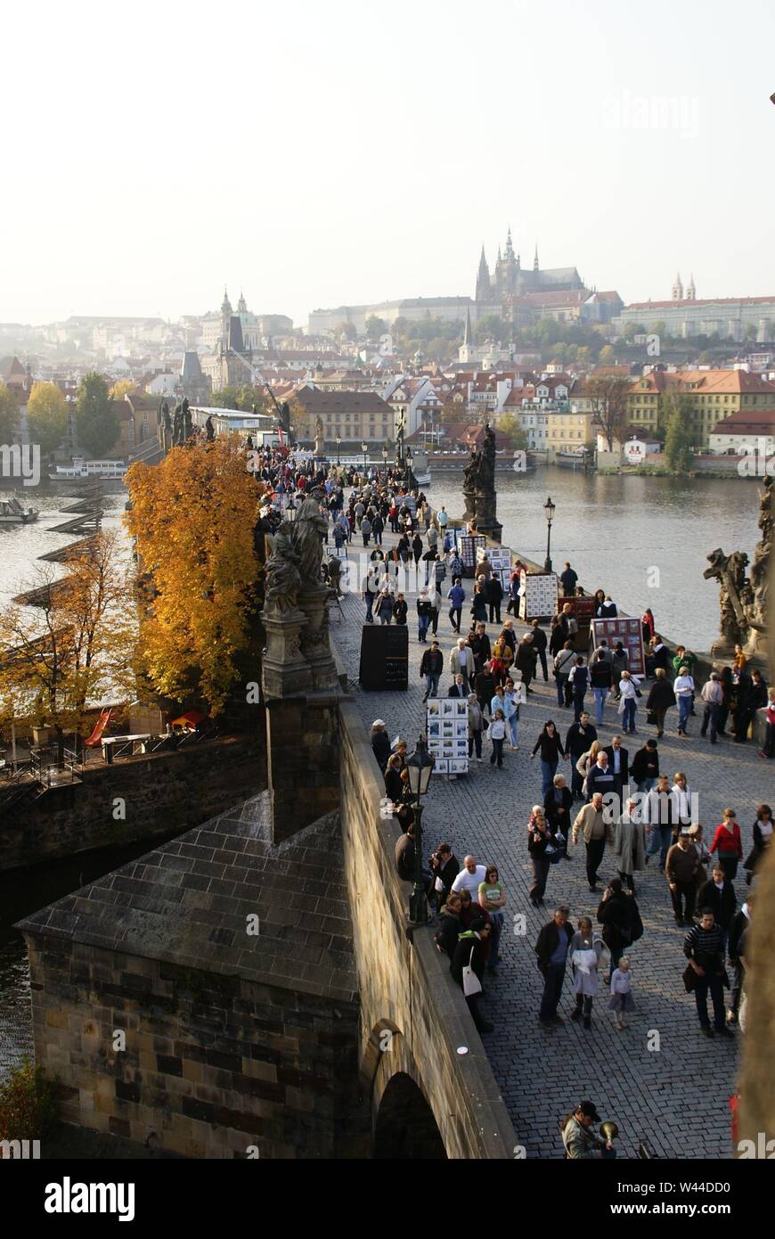 Prague, Czech Republic - October 5, 2008: A crowd of tourists crosses ...