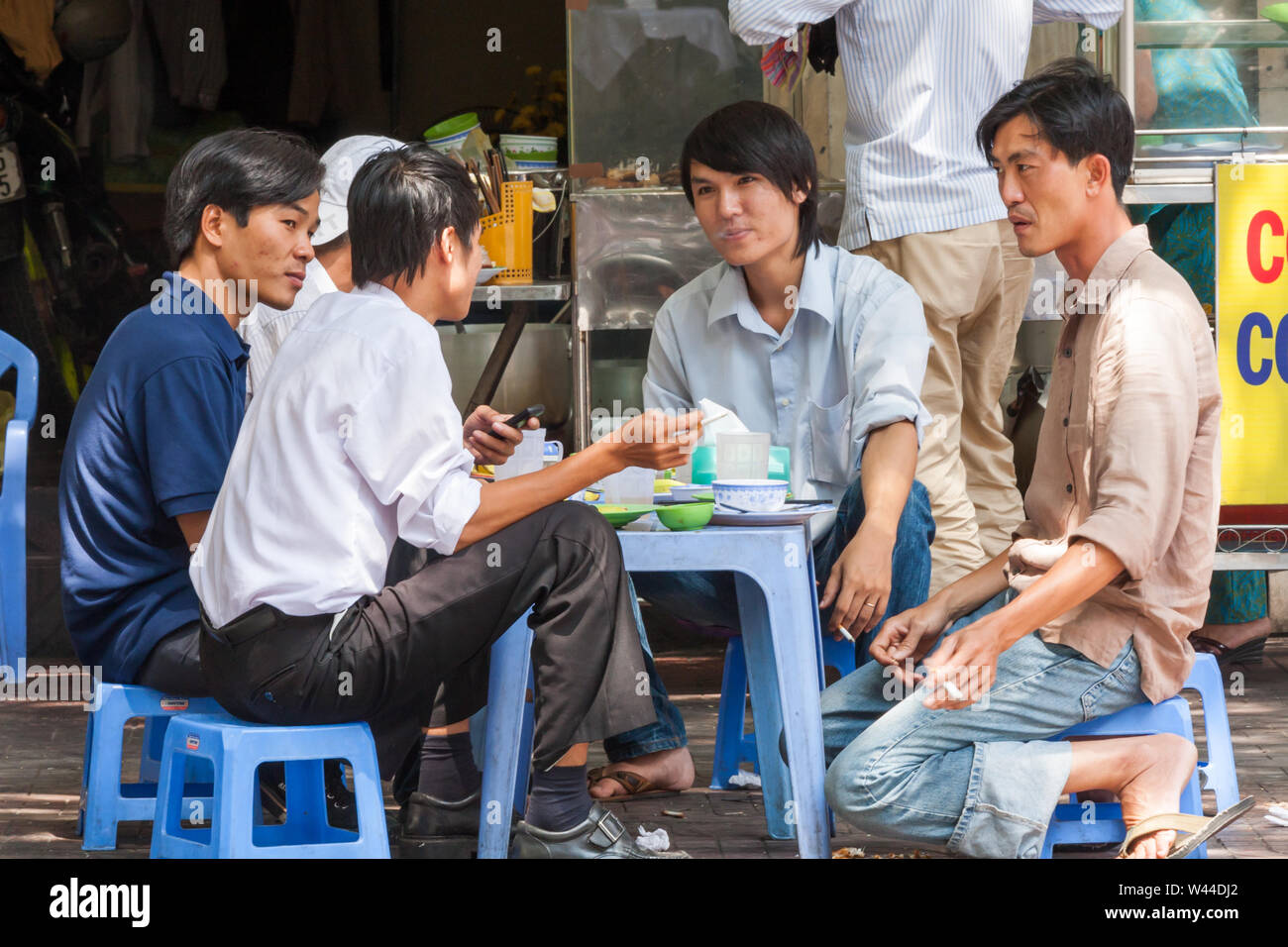 Ho Chi Minh City, Vietnam - February 24th 2010: Young Vietnamese men ...