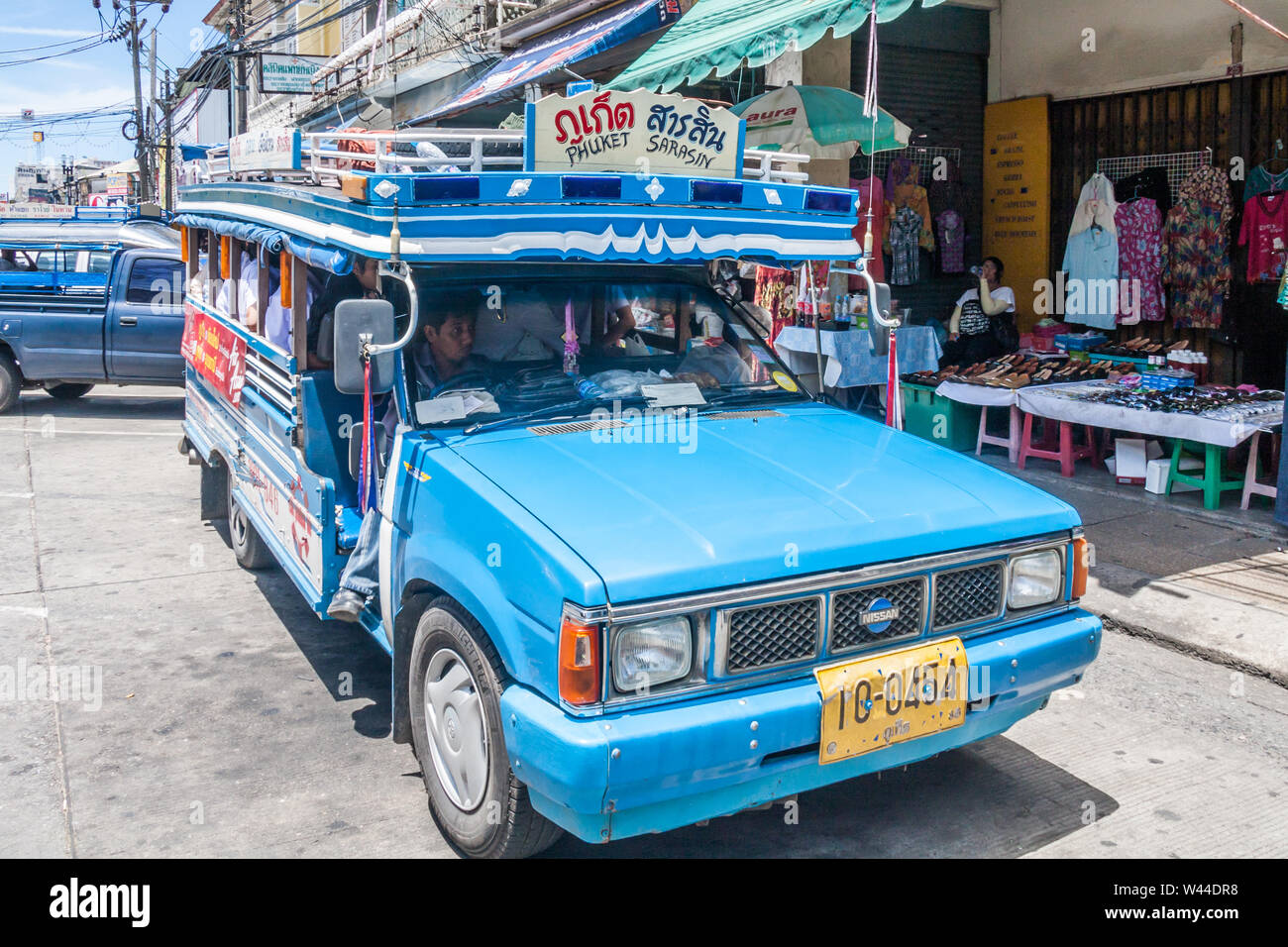 Phuket, Thailand - May 20th 2010: Traditional, blue public bus. This is ...