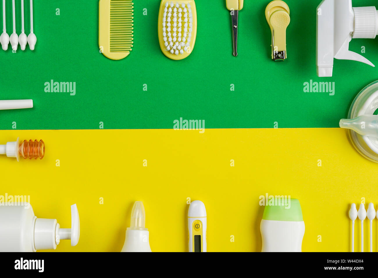 Pediatric micro enemas on green and yellow background Stock Photo - Alamy