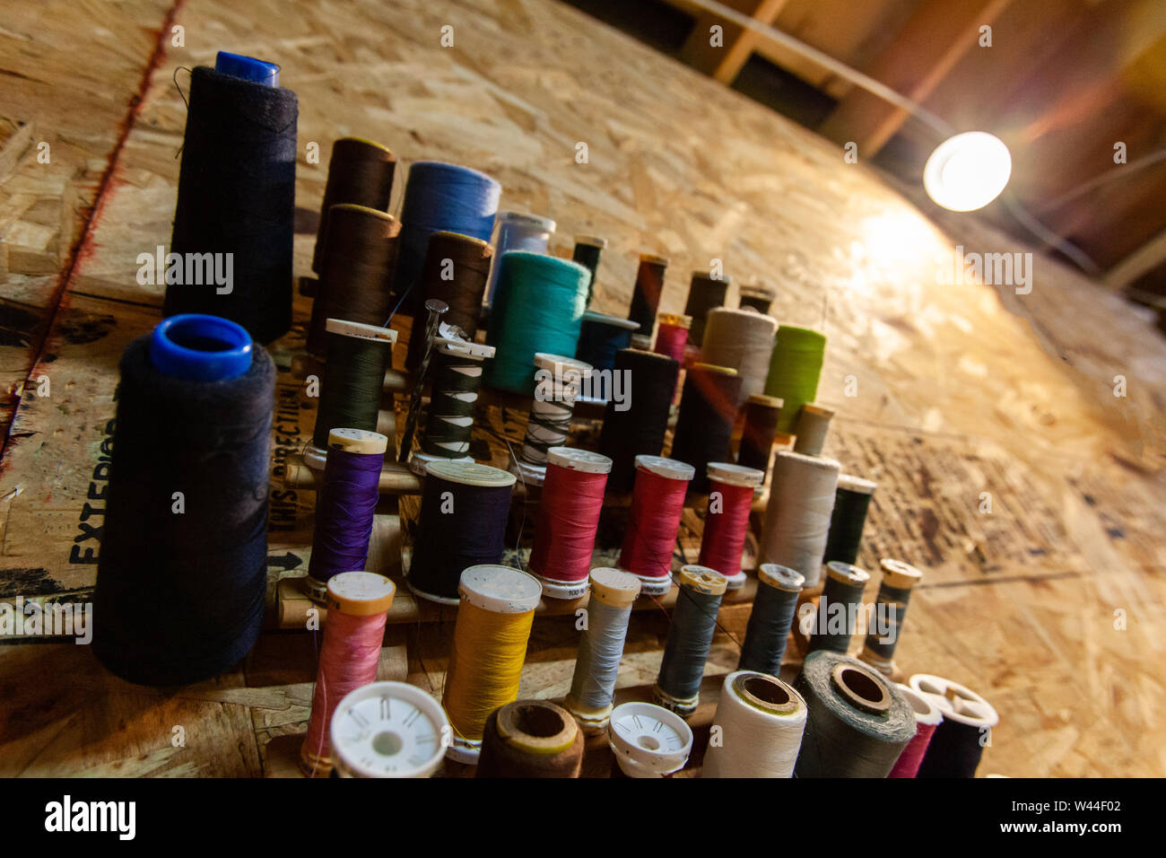 Different spools of a sewing machine hi-res stock photography and ...