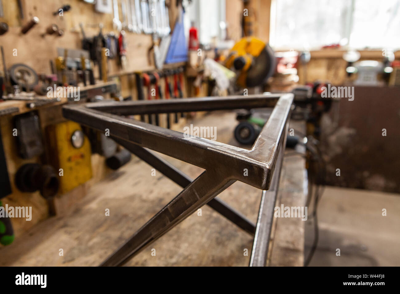 A closeup view on the triangular top of a geometric metal frame created ...