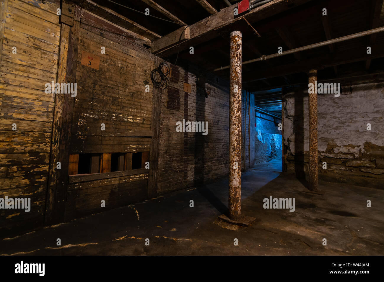 Interior of old grungy warehouse basement Stock Photo - Alamy