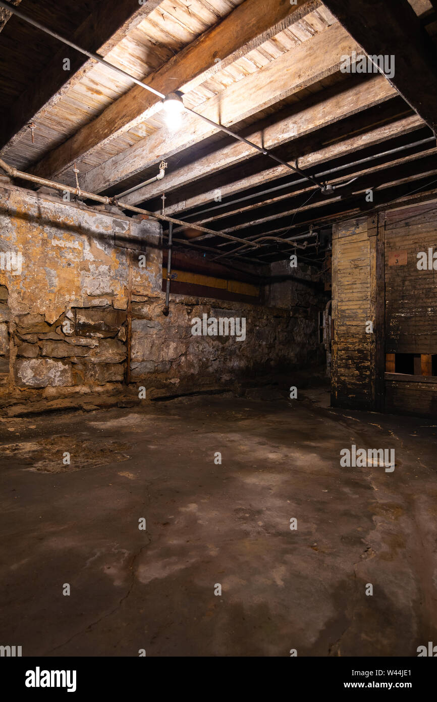 Interior of old grungy warehouse basement Stock Photo - Alamy
