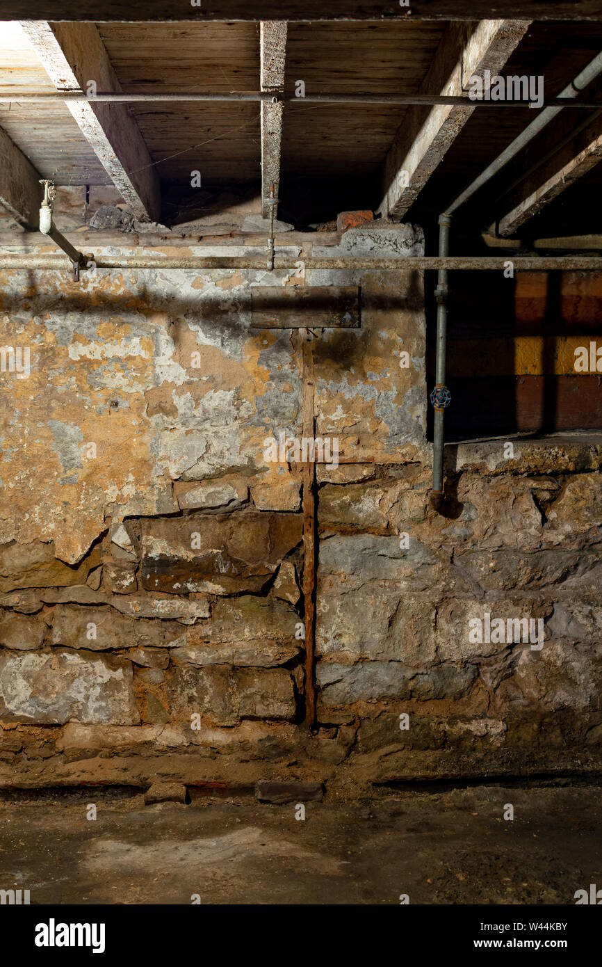 Interior of old grungy warehouse basement Stock Photo - Alamy