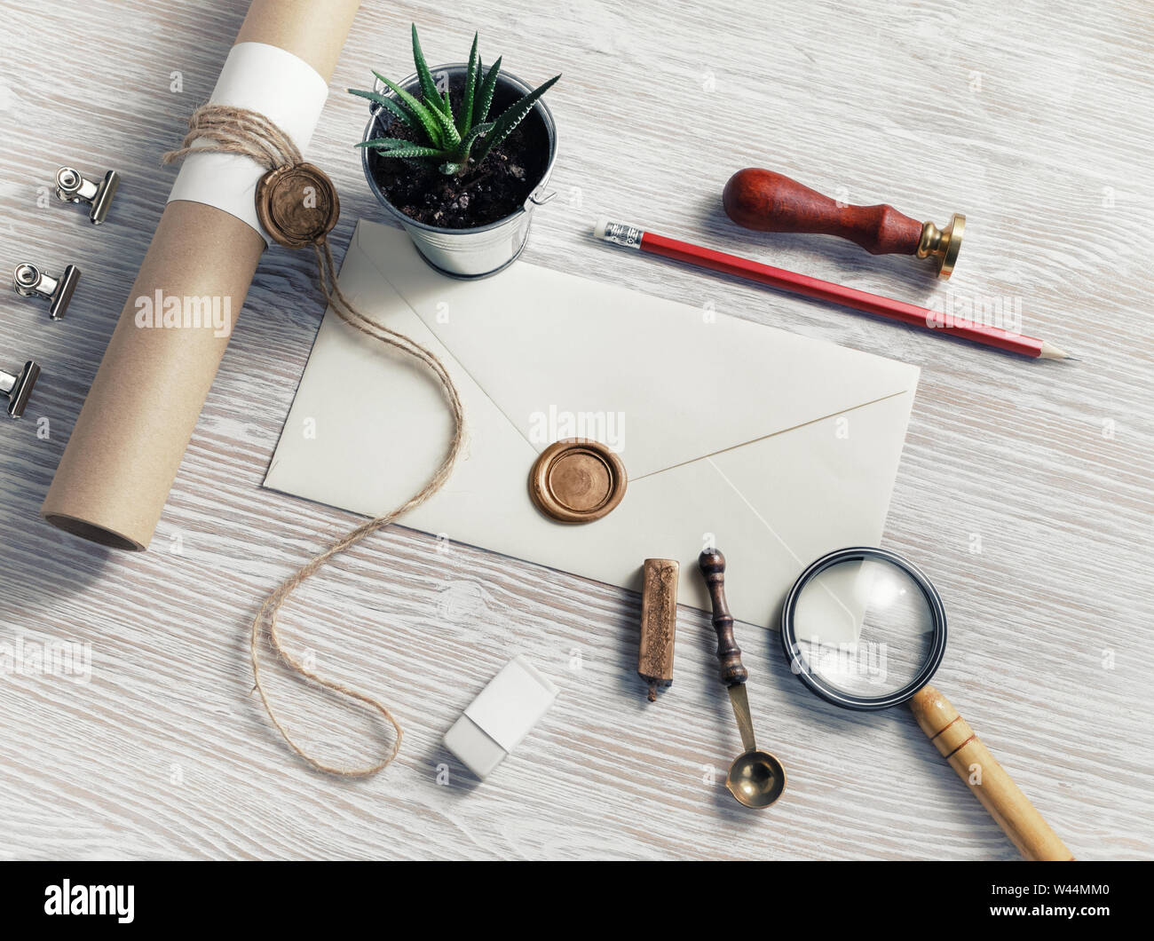 Vintage stationery set on light wood table background Stock Photo - Alamy