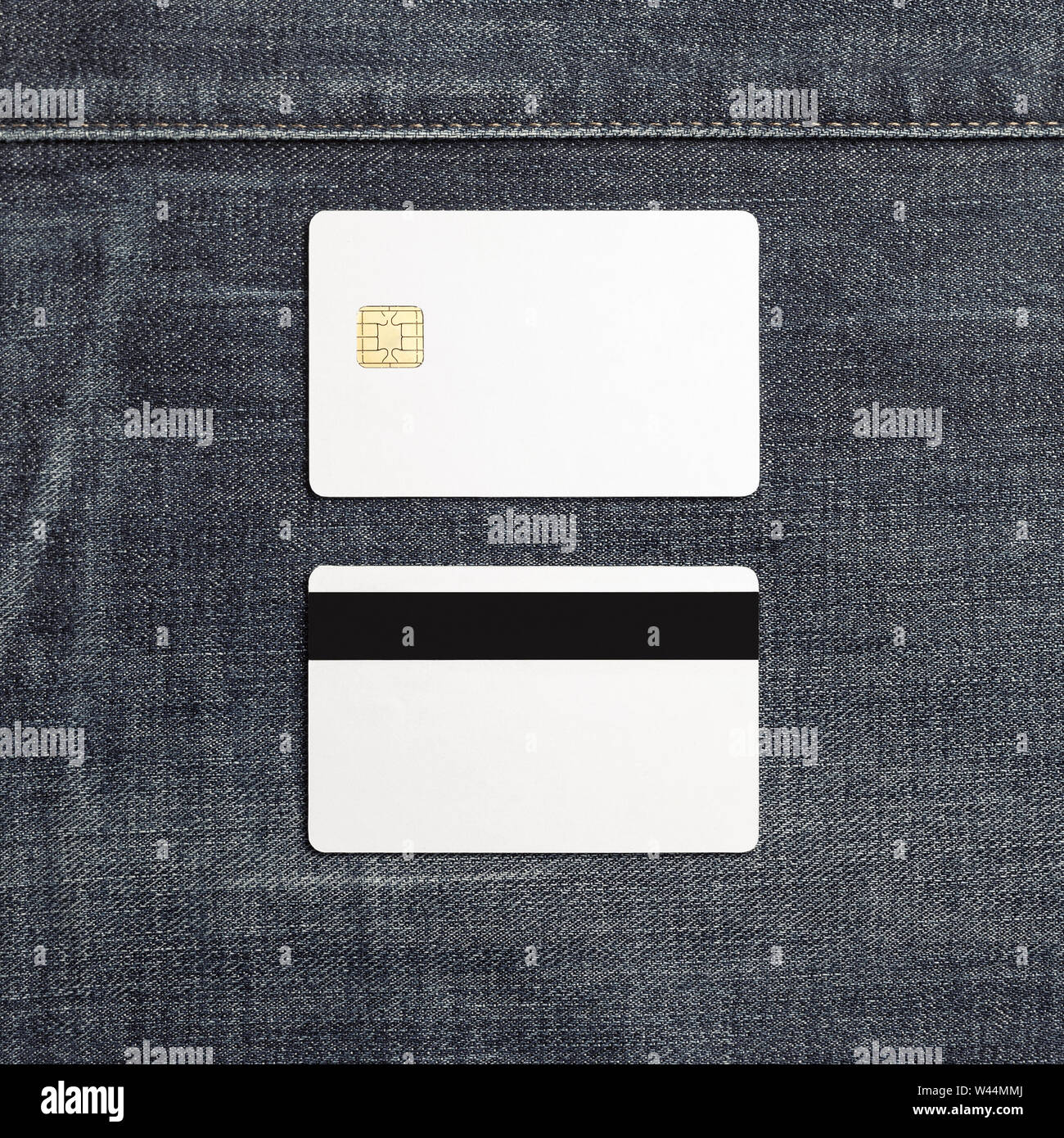 Blank plastic credit cards on denim background. Chip cards. Front and ...
