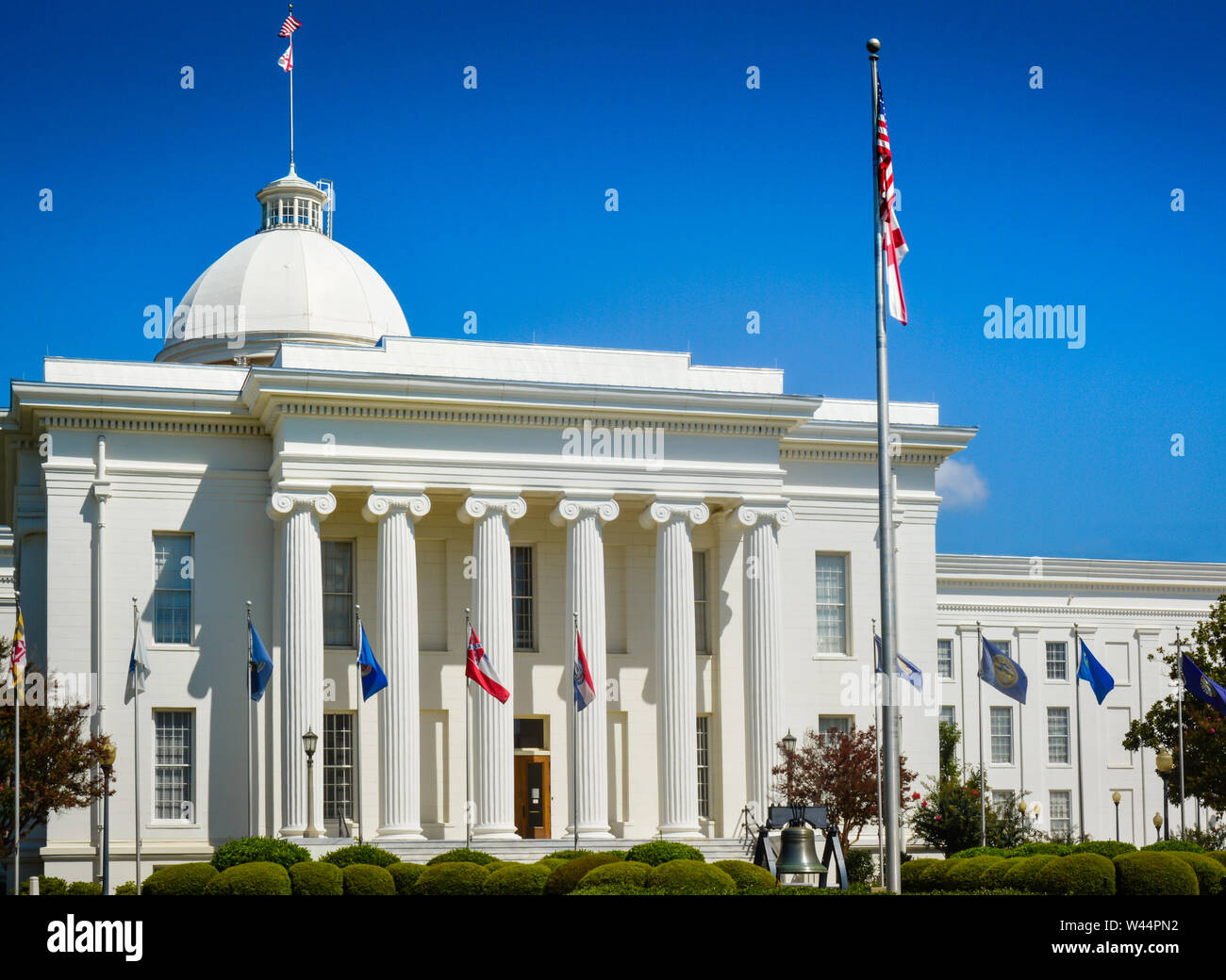 The Avenue of flags and a replica of the Liberty Bell before the ...