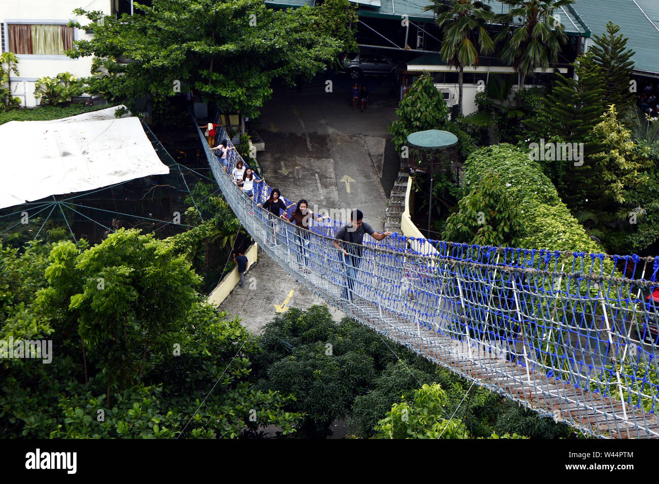 ANTIPOLO CITY, PHILIPPINES – JULY 17, 2019: Hanging bridge which leads ...