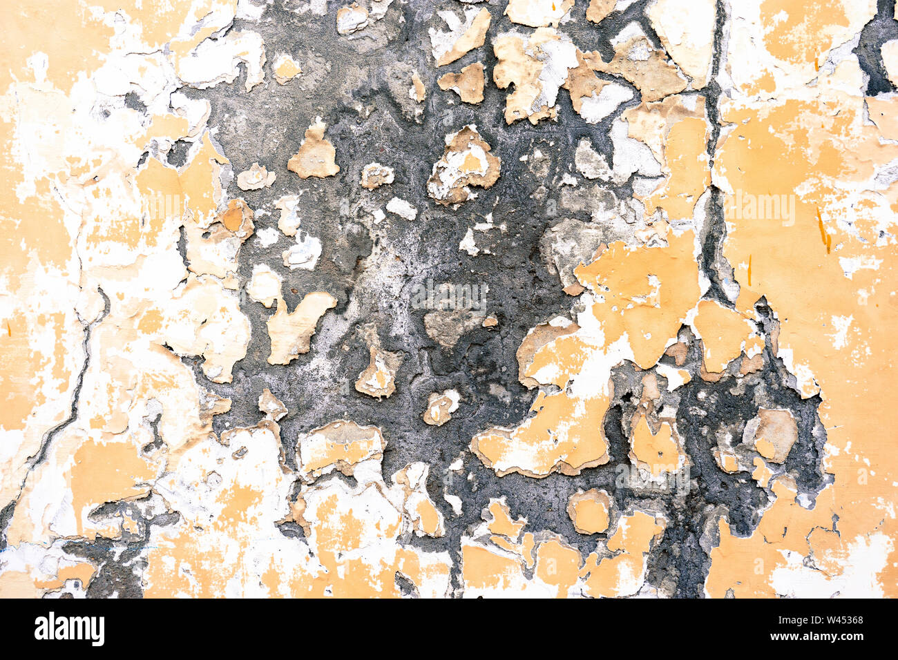 Abstract yellow wall background with scuffs and cracks Stock Photo - Alamy