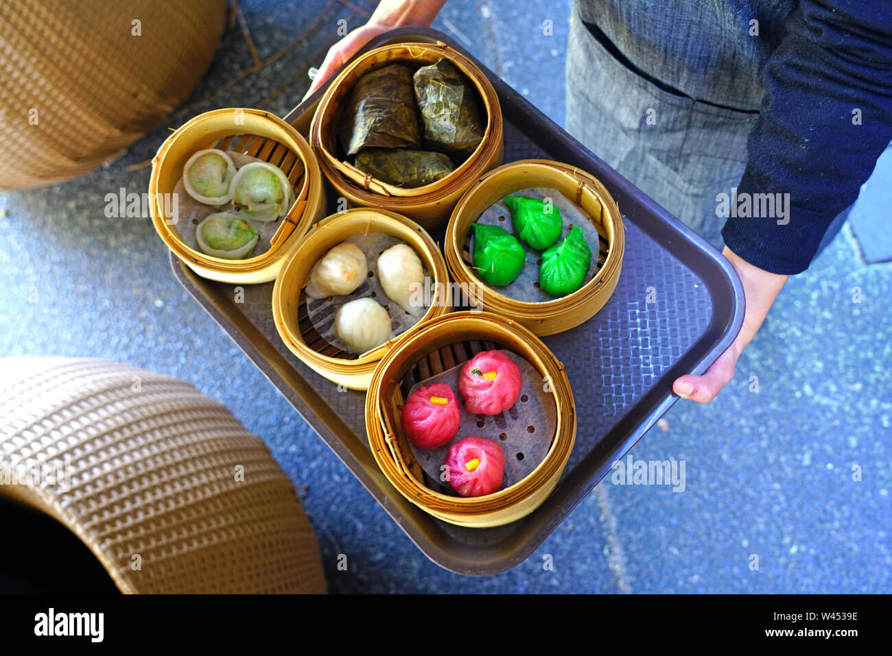 Tray of colorful Dim sum dumplings in a steam basket Stock Photo - Alamy