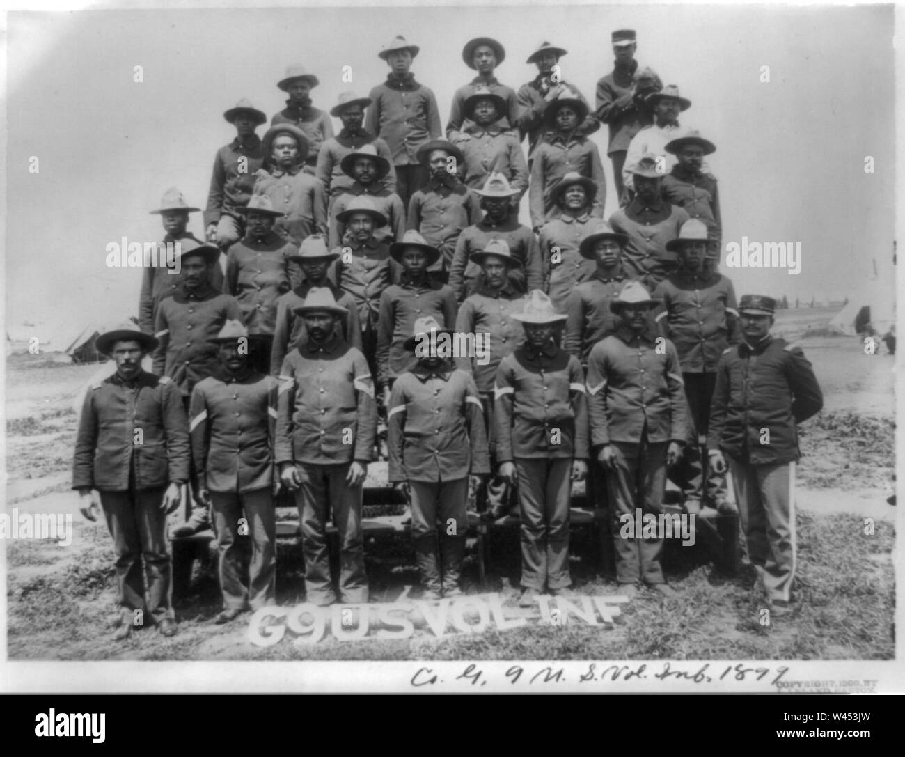 Company G, 9th U.S. volunteer infantry, posed on tier Stock Photo - Alamy