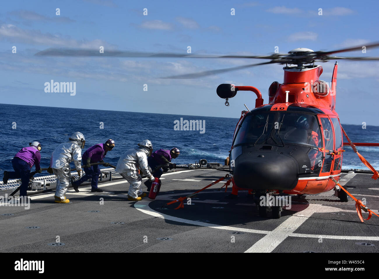 PACIFIC OCEAN—Crewmembers from U.S. Coast Guard Cutter Bertholf conduct ...