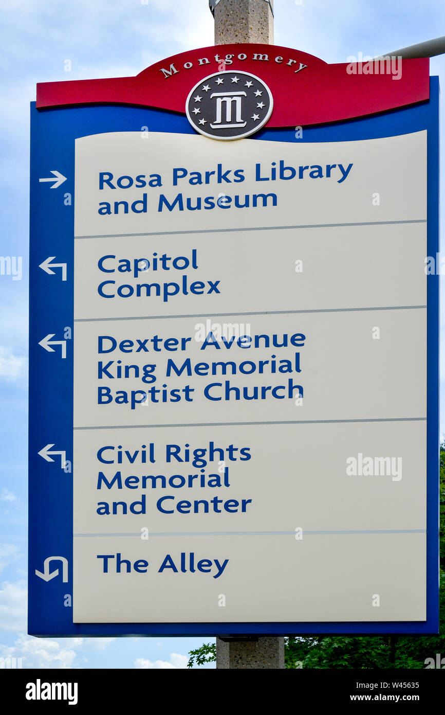 A red, white and blue city of Montgomery signboard for directional ...