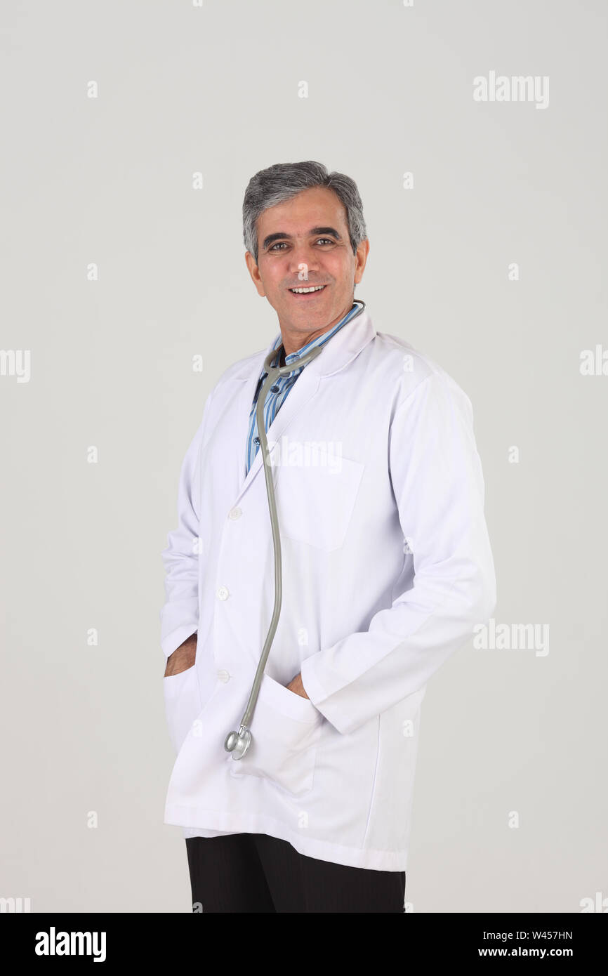 Portrait of a male doctor smiling Stock Photo - Alamy
