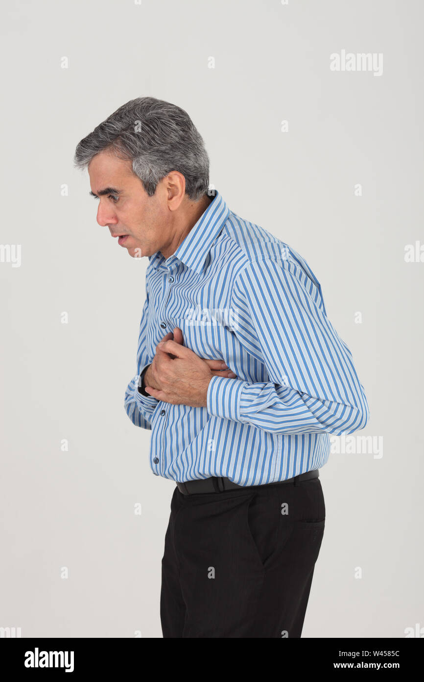 Man suffering from chest pain Stock Photo - Alamy