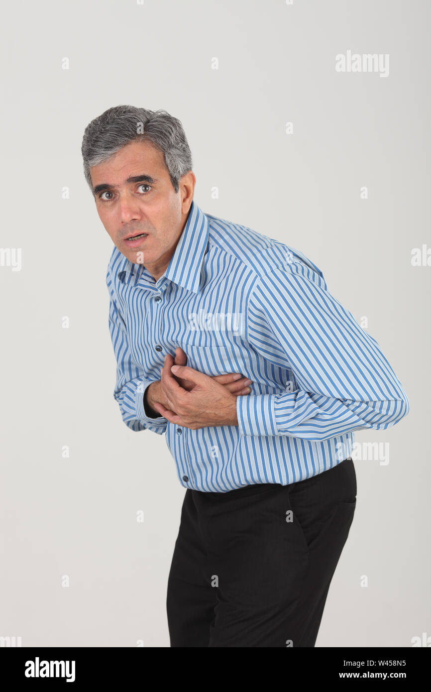 Indian man chest pain hi-res stock photography and images - Alamy