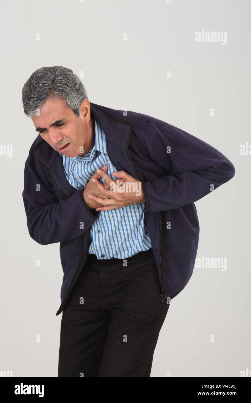 Man suffering from chest pain Stock Photo - Alamy