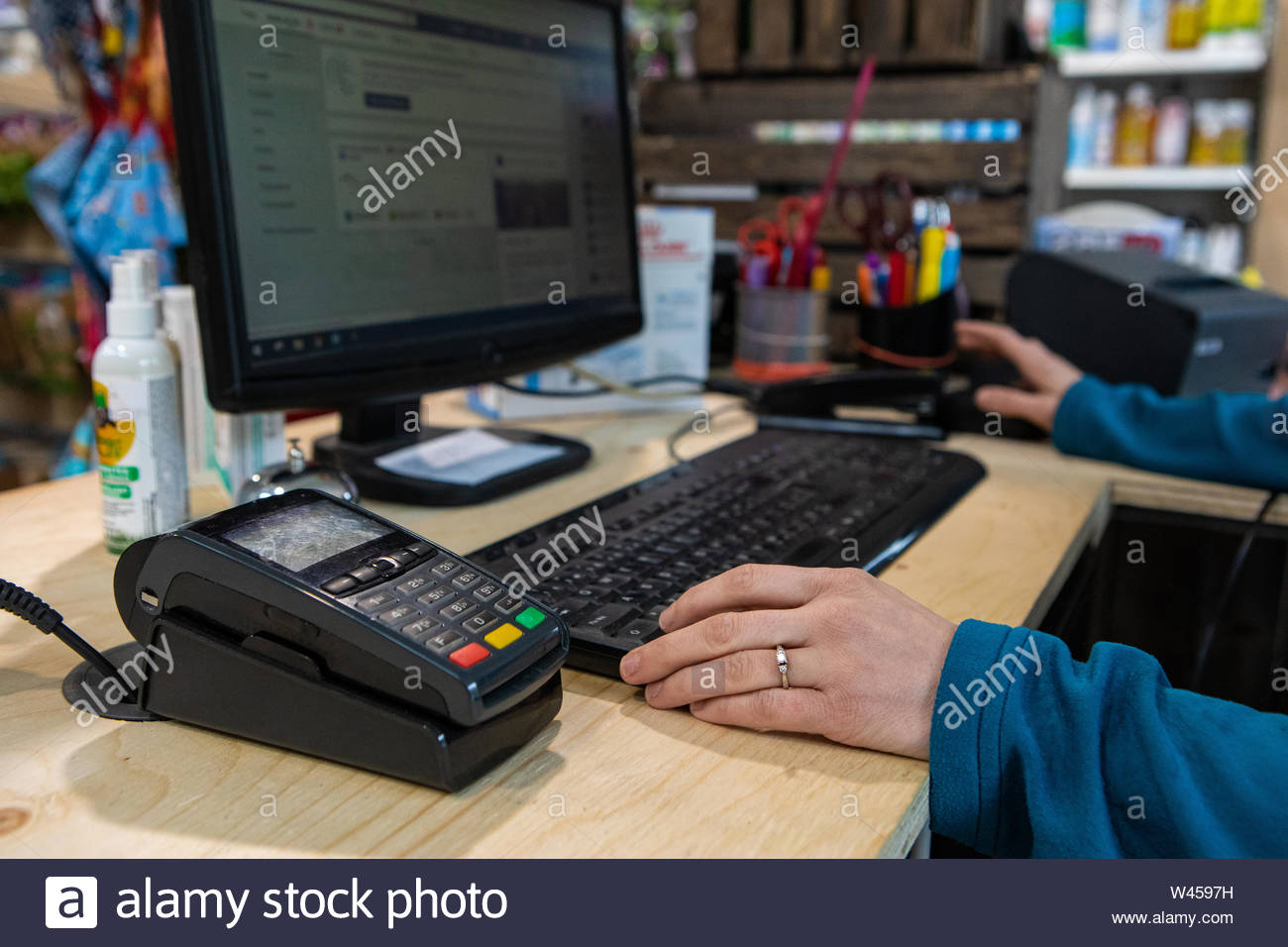 Cashier Employee Working High Resolution Stock Photography and Images ...