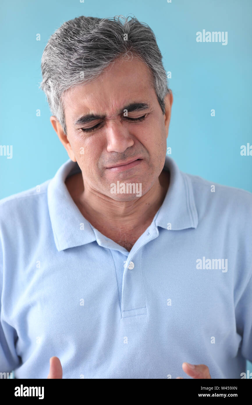 Man looking sad Stock Photo - Alamy