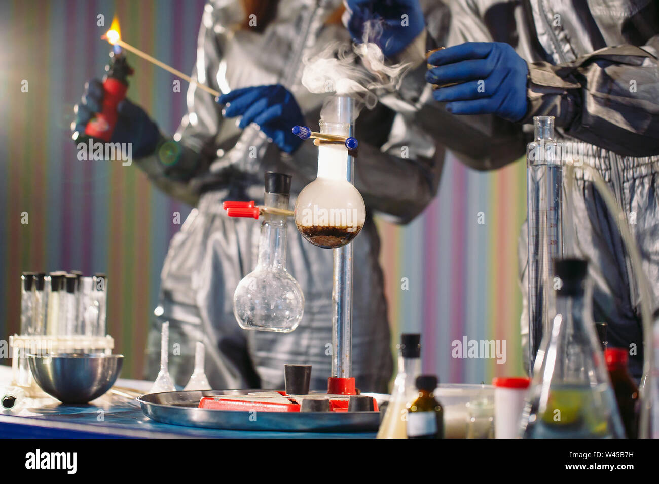 Experiments in a chemistry lab. conducting an experiment in the ...