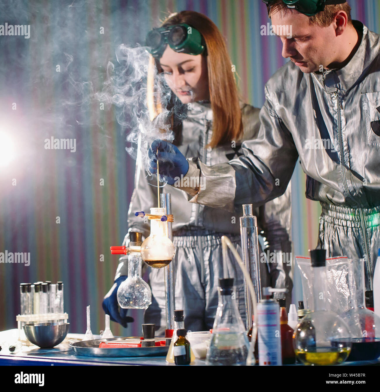 Experiments in a chemistry lab. conducting an experiment in the ...