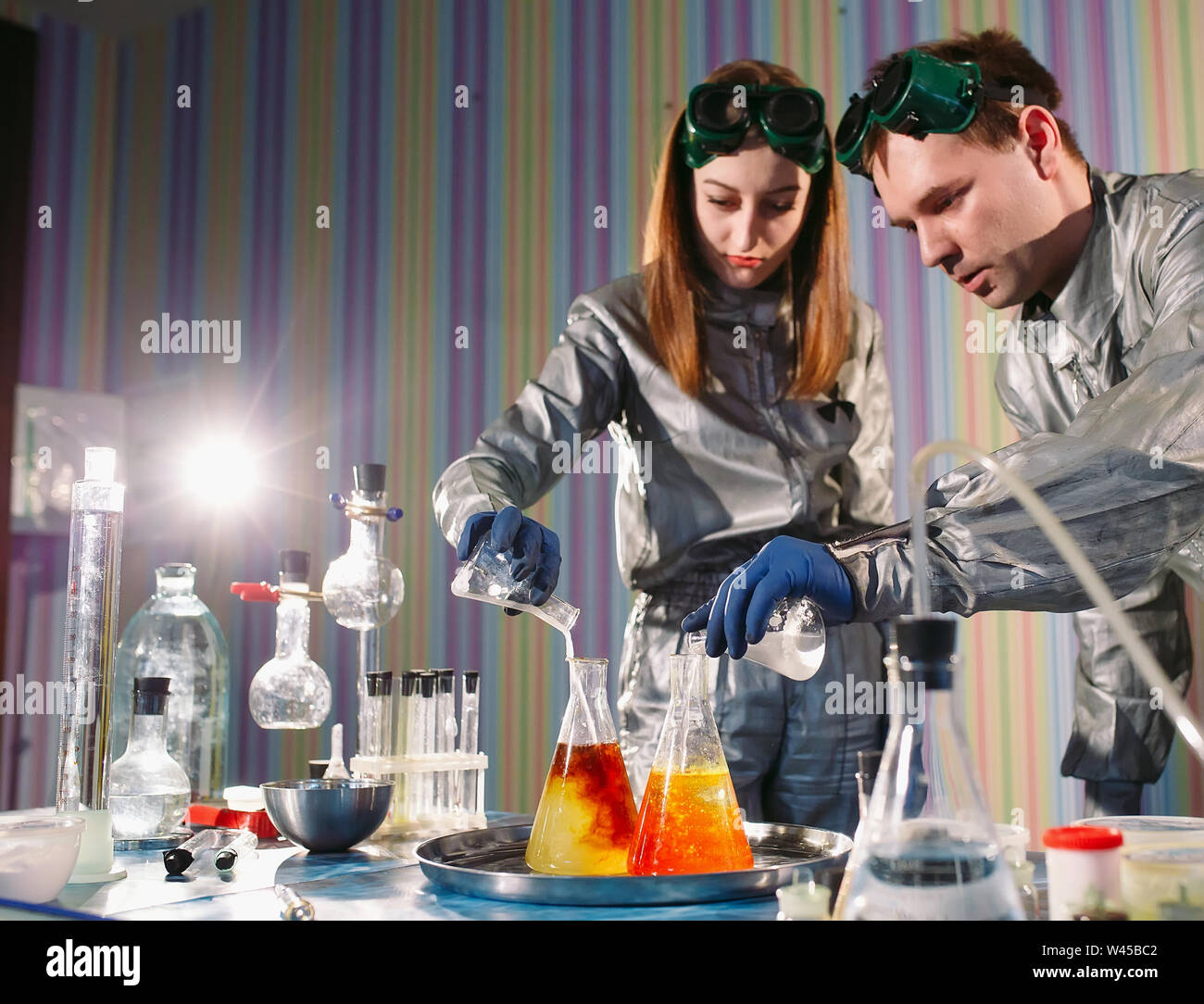 Experiments in a chemistry lab. conducting an experiment in the ...