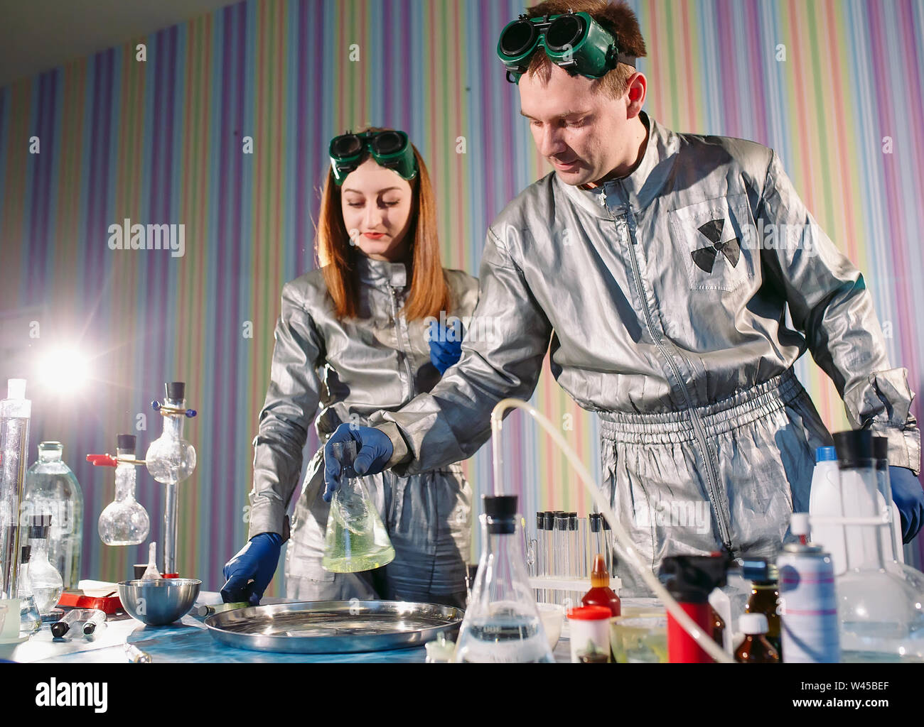 Experiments in a chemistry lab. conducting an experiment in the ...