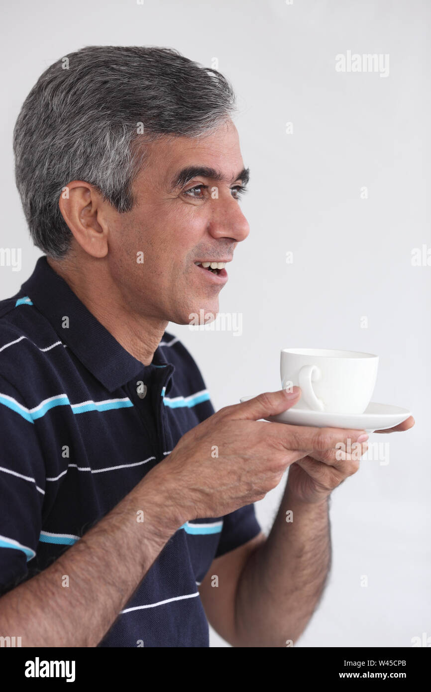Man having tea Stock Photo - Alamy