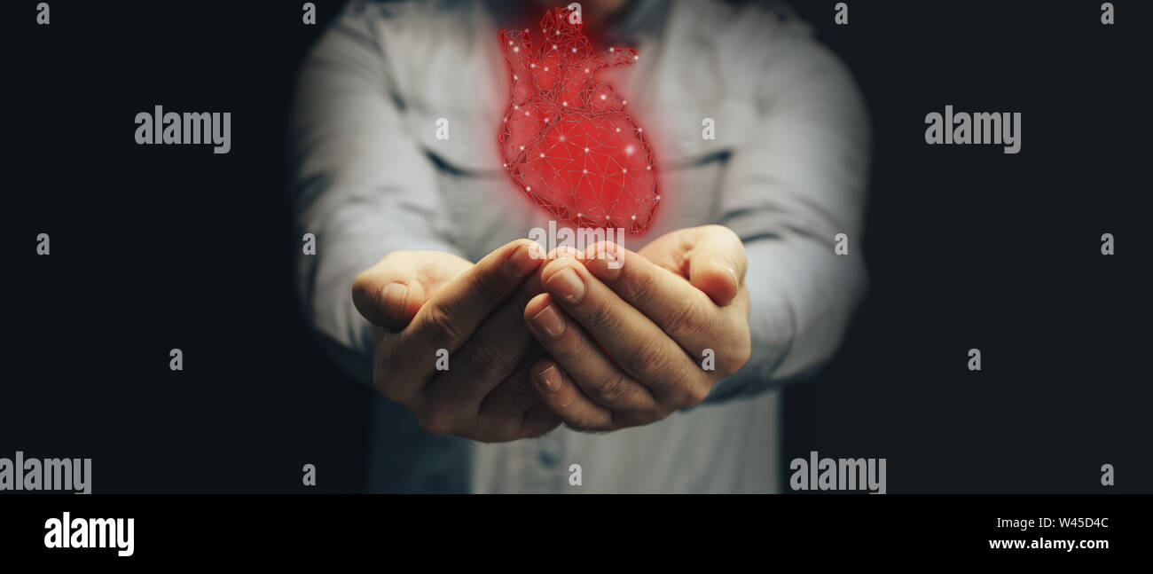 Human hand holding neon red heart innovative technologies. Mixed media ...