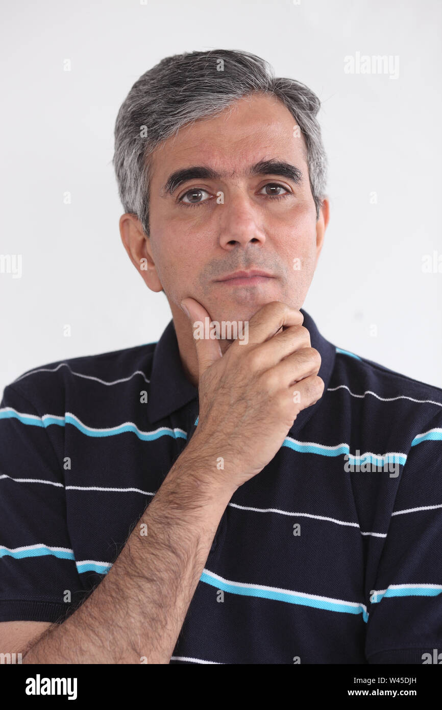 Portrait of a man thinking Stock Photo - Alamy