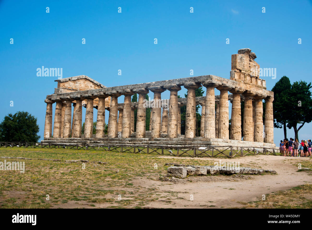 PAESTUM, ITALY, July 2018, Tourist at Ceres temple, South-East view ...
